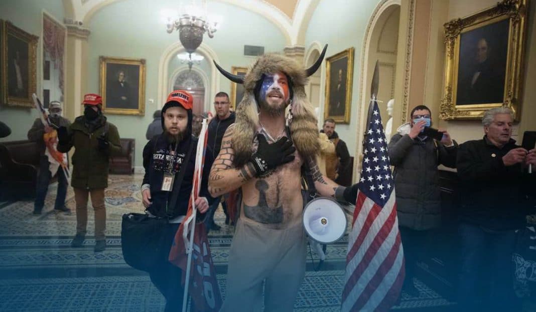 Capitol Riot: ‘QAnon Shaman’ is Sentenced to 3.5-Years Behind Bars